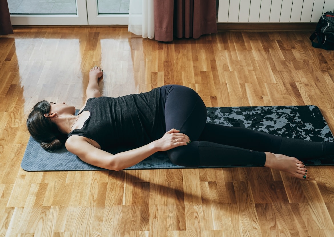 Sit All Day? The Open Book Stretch Can Give Your Stiff, S... | theSkimm